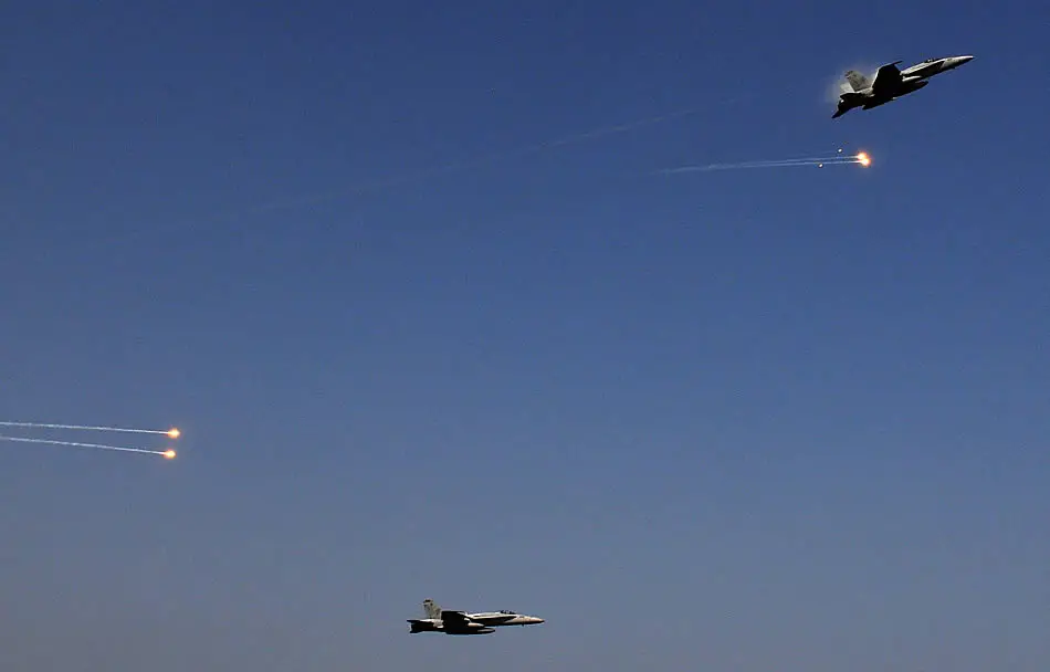Military Photos F/A-18 Release Flares Over Arabian Sea